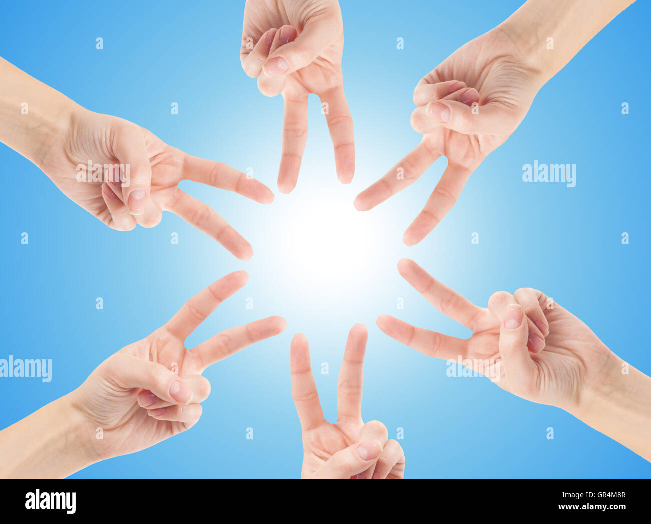 Hands of teamwork , forming the star shape Stock Photo - Alamy