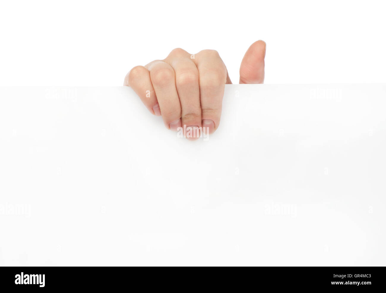 Advertising: Hand holding white empty paper Stock Photo - Alamy
