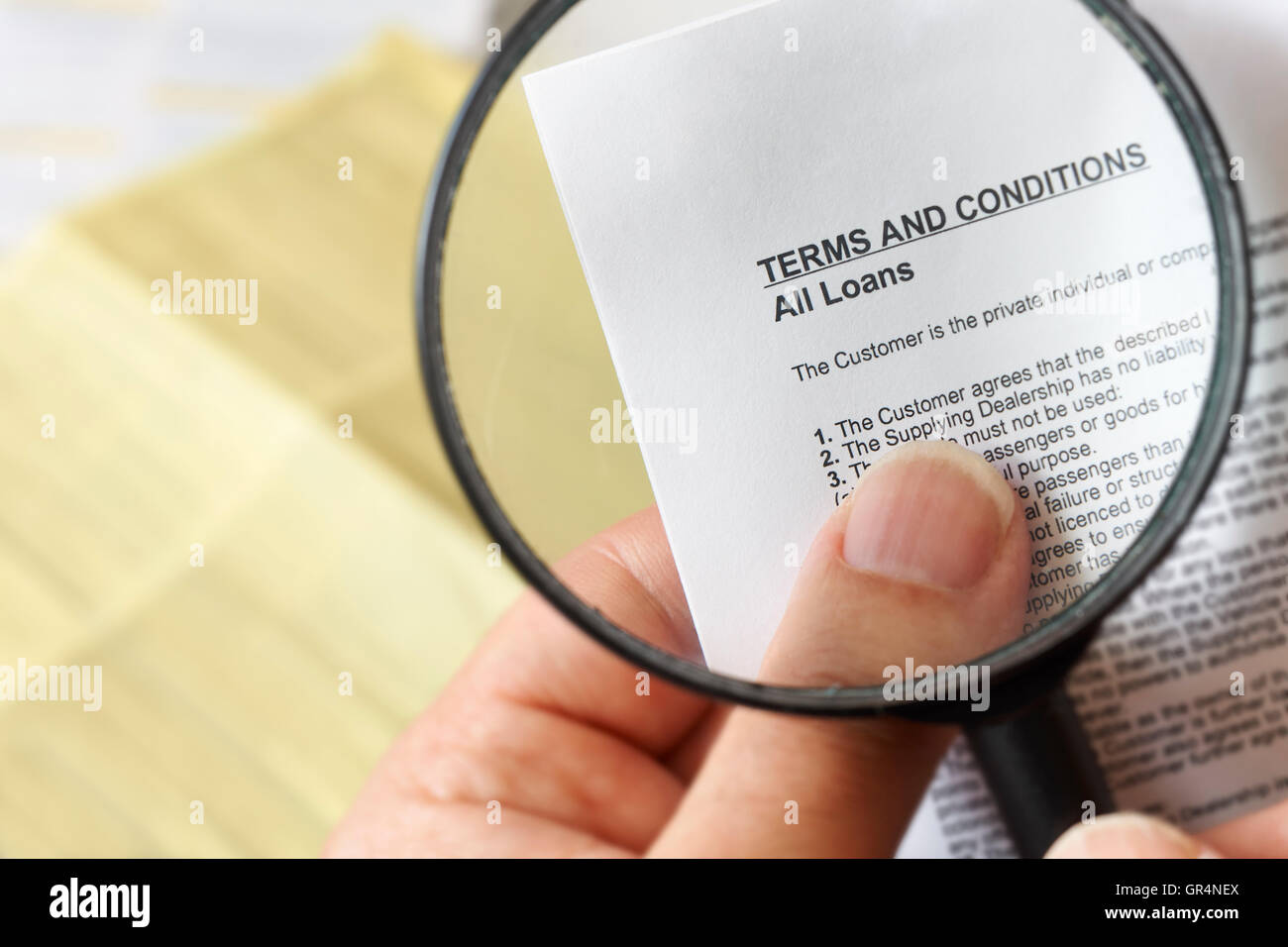 Small print magnifying glass hi-res stock photography and images - Alamy
