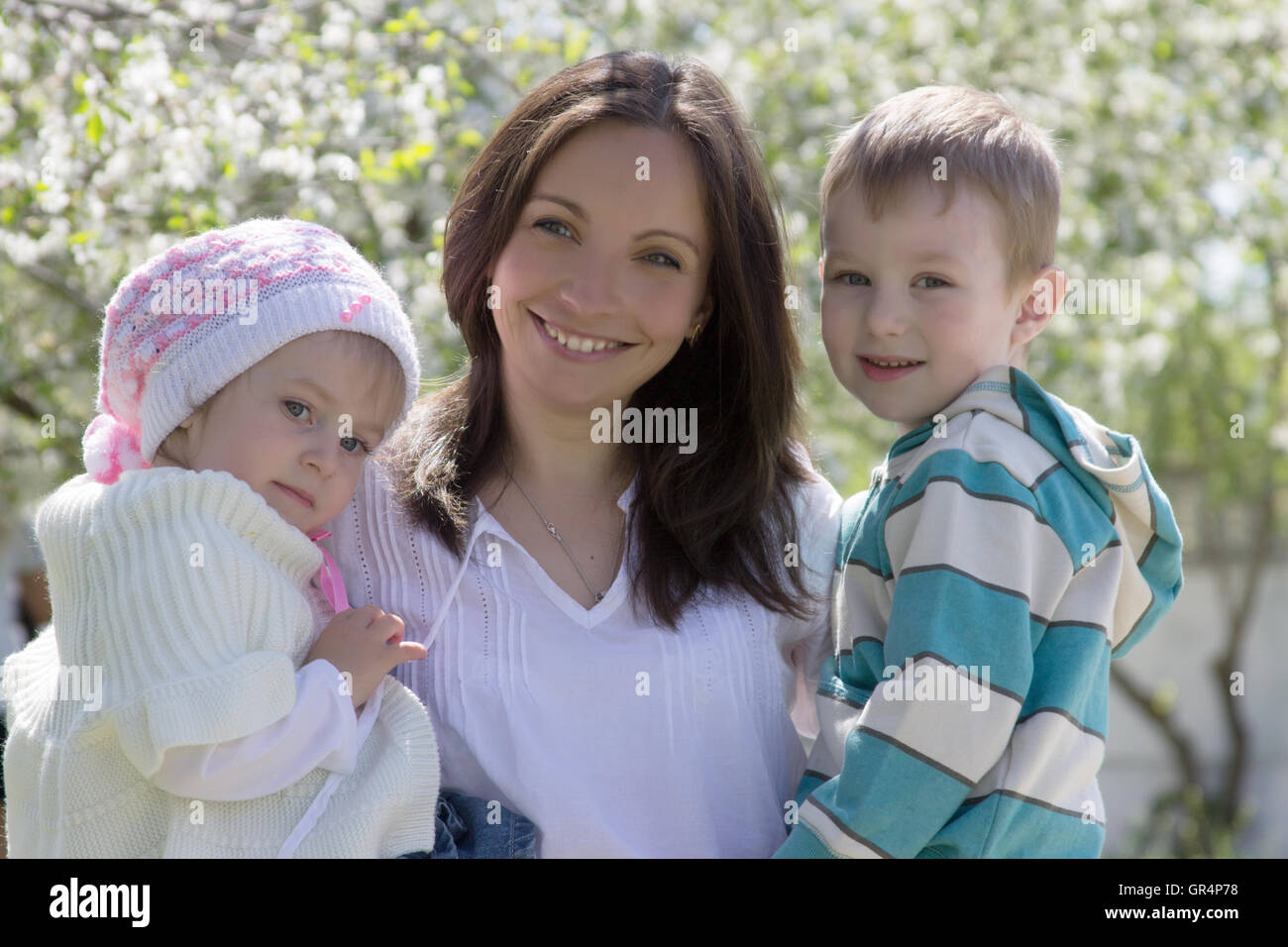 Happy mother with two children Stock Photo - Alamy