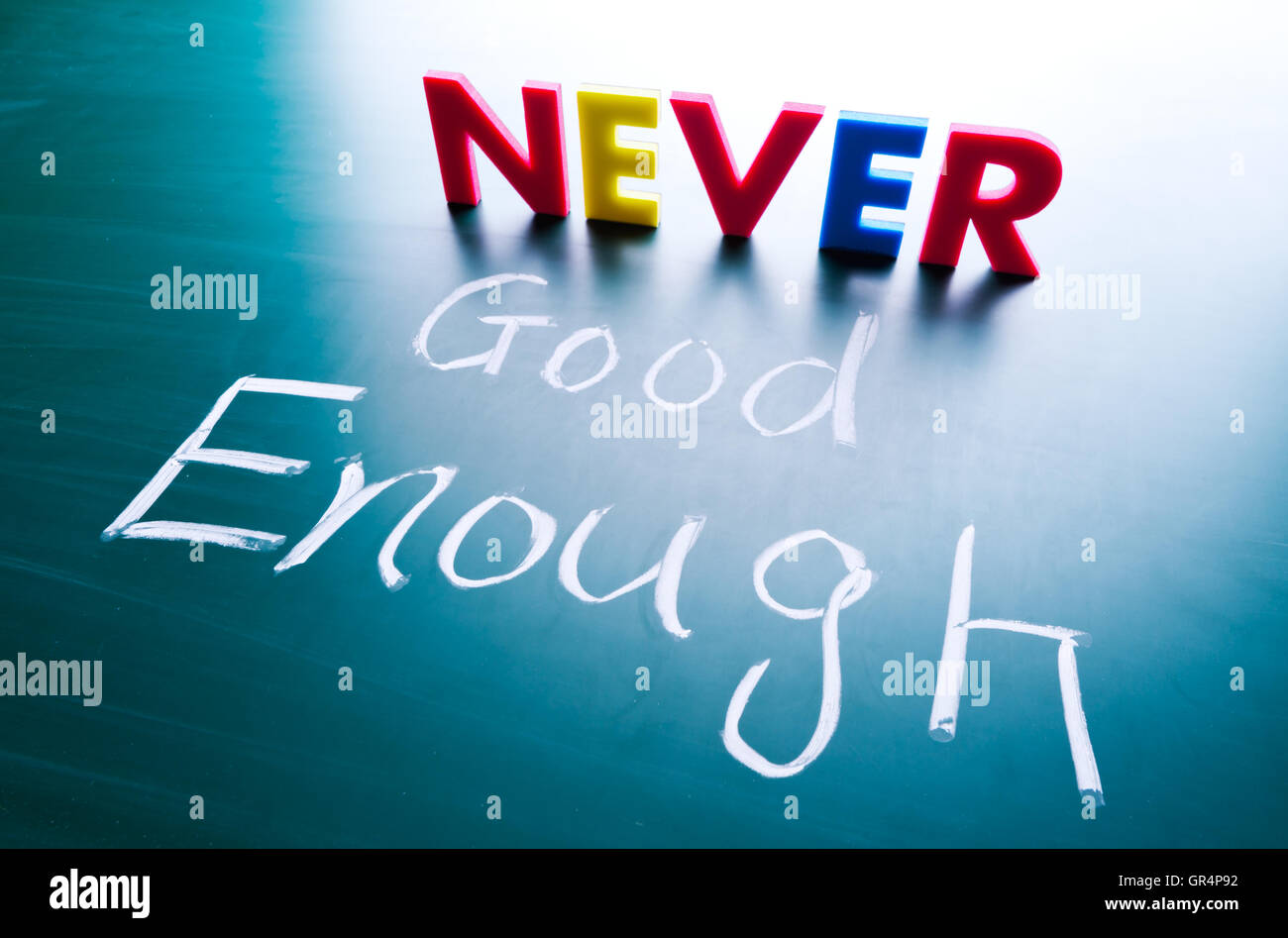 Never good enough concept Stock Photo - Alamy Never good enough concept Stock Photo - Alamy