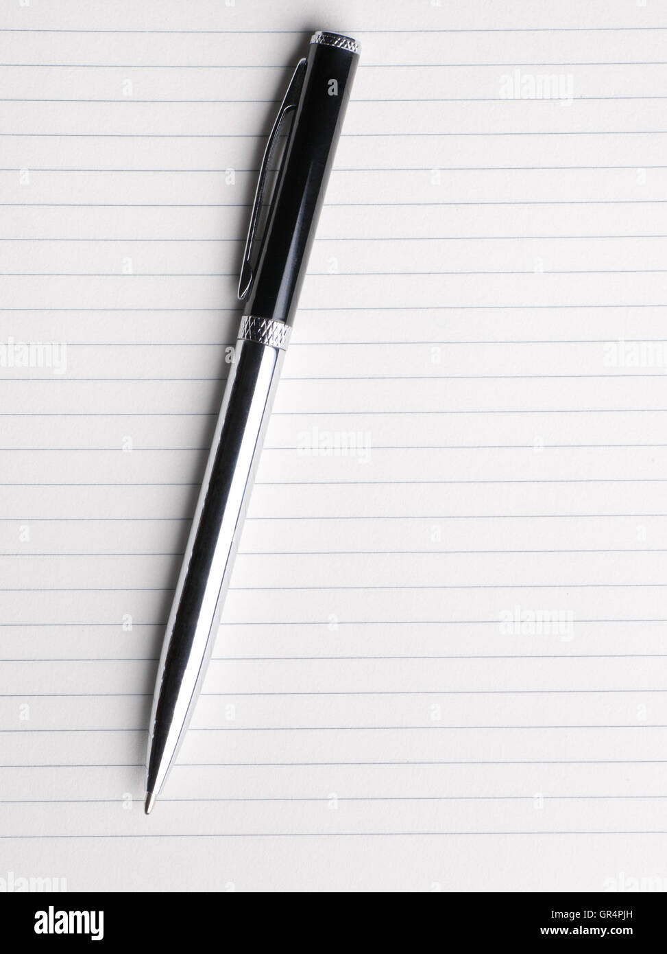 Blank notebook paper with pen. isolated on white Stock Photo - Alamy Blank notebook paper with pen. isolated on white Stock Photo - Alamy