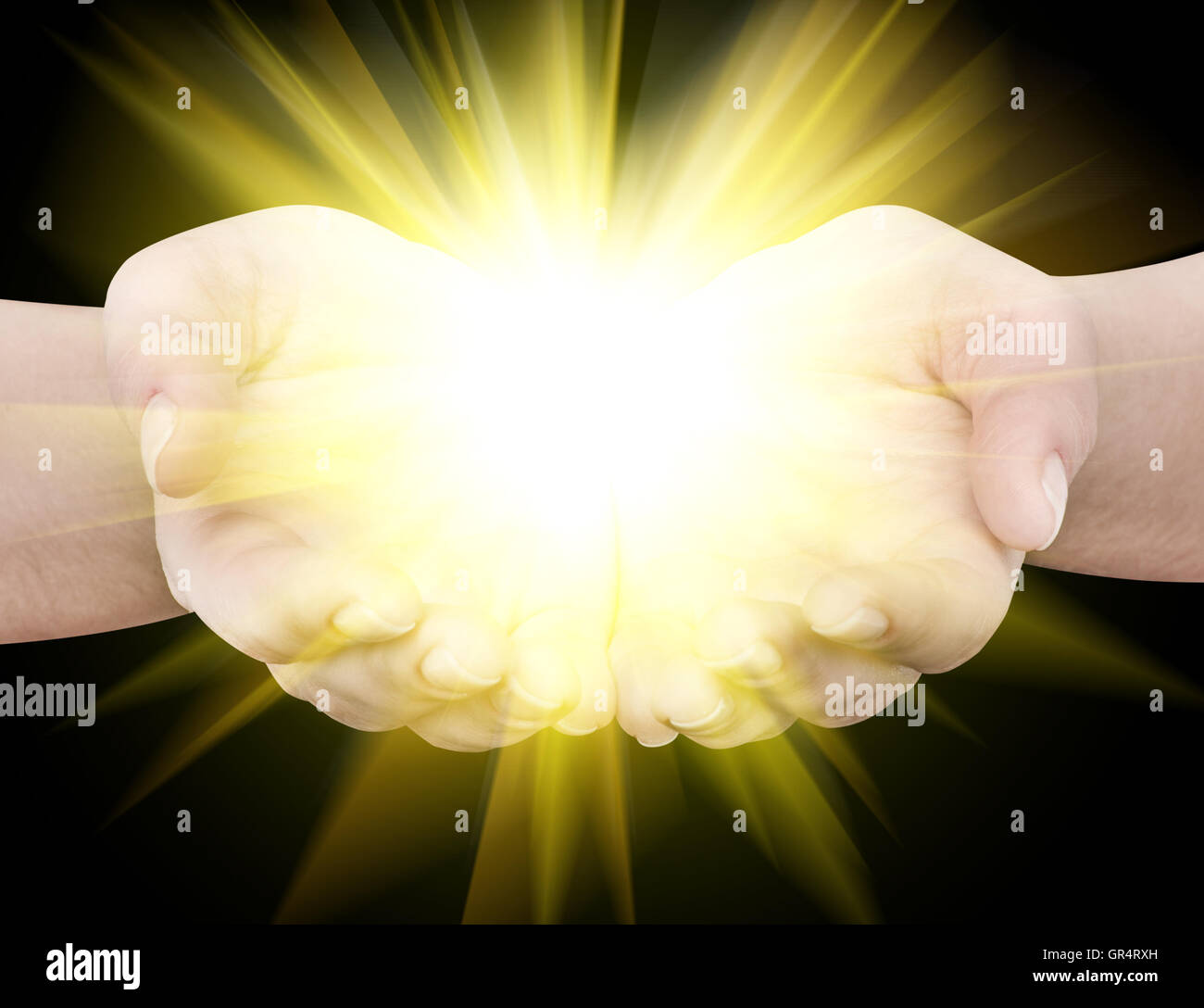 Holding hands open with glowing lights Stock Photo - Alamy