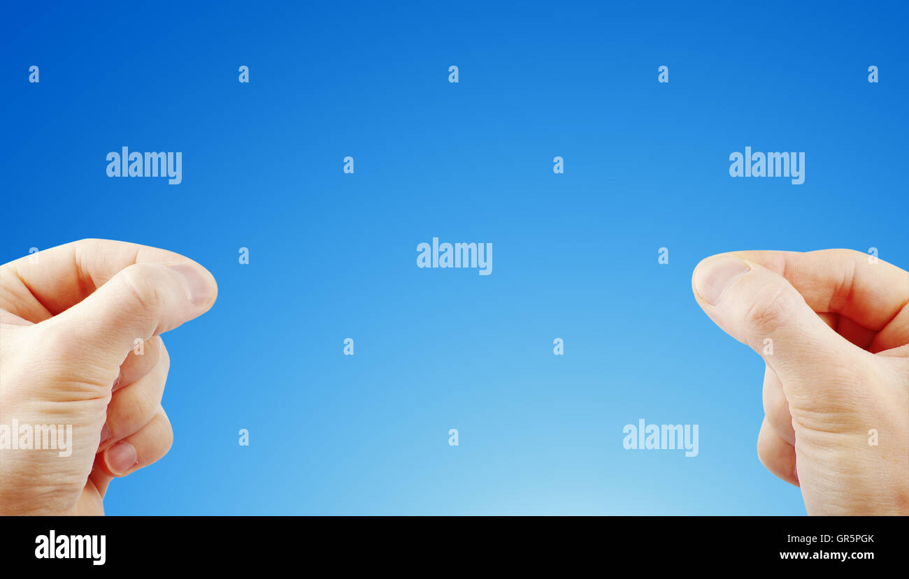 well shaped male hand and arm holding for something Stock Photo - Alamy