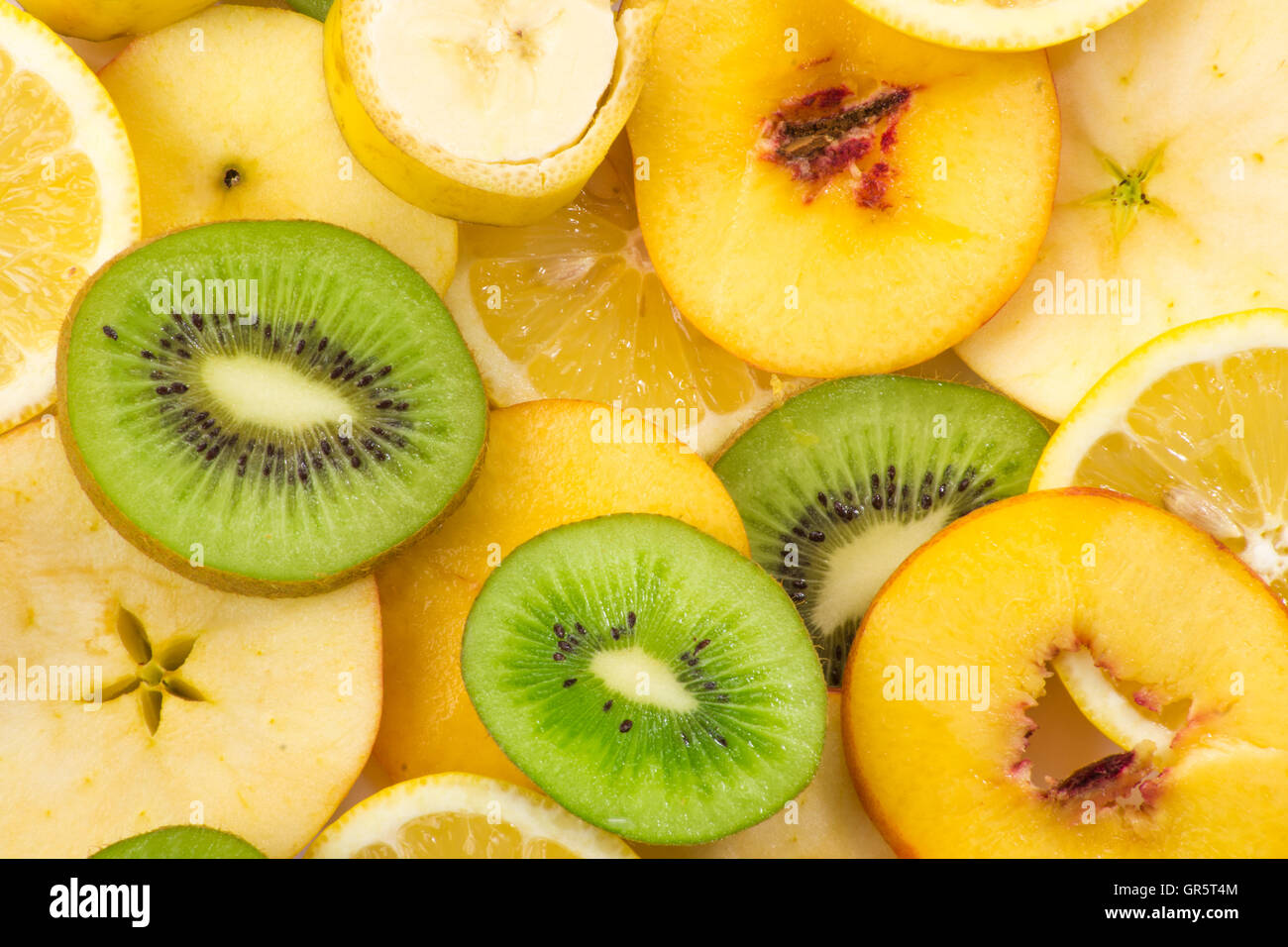 Sliced fruits background Stock Photo - Alamy