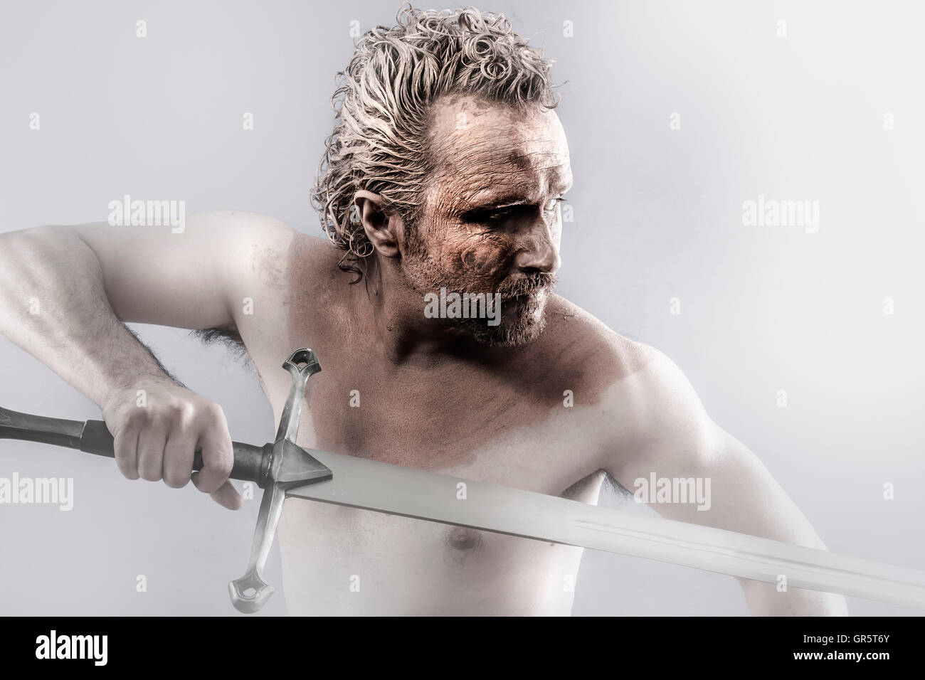 Man covered in clay dirt hi-res stock photography and images - Alamy