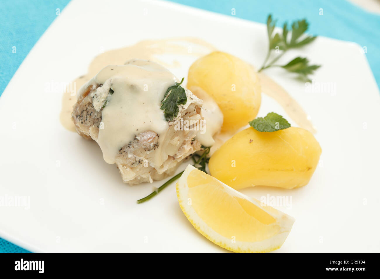 fish with potatoes Stock Photo - Alamy