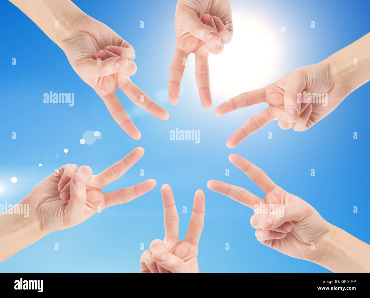 Hands of teamwork , forming the star shape Stock Photo - Alamy