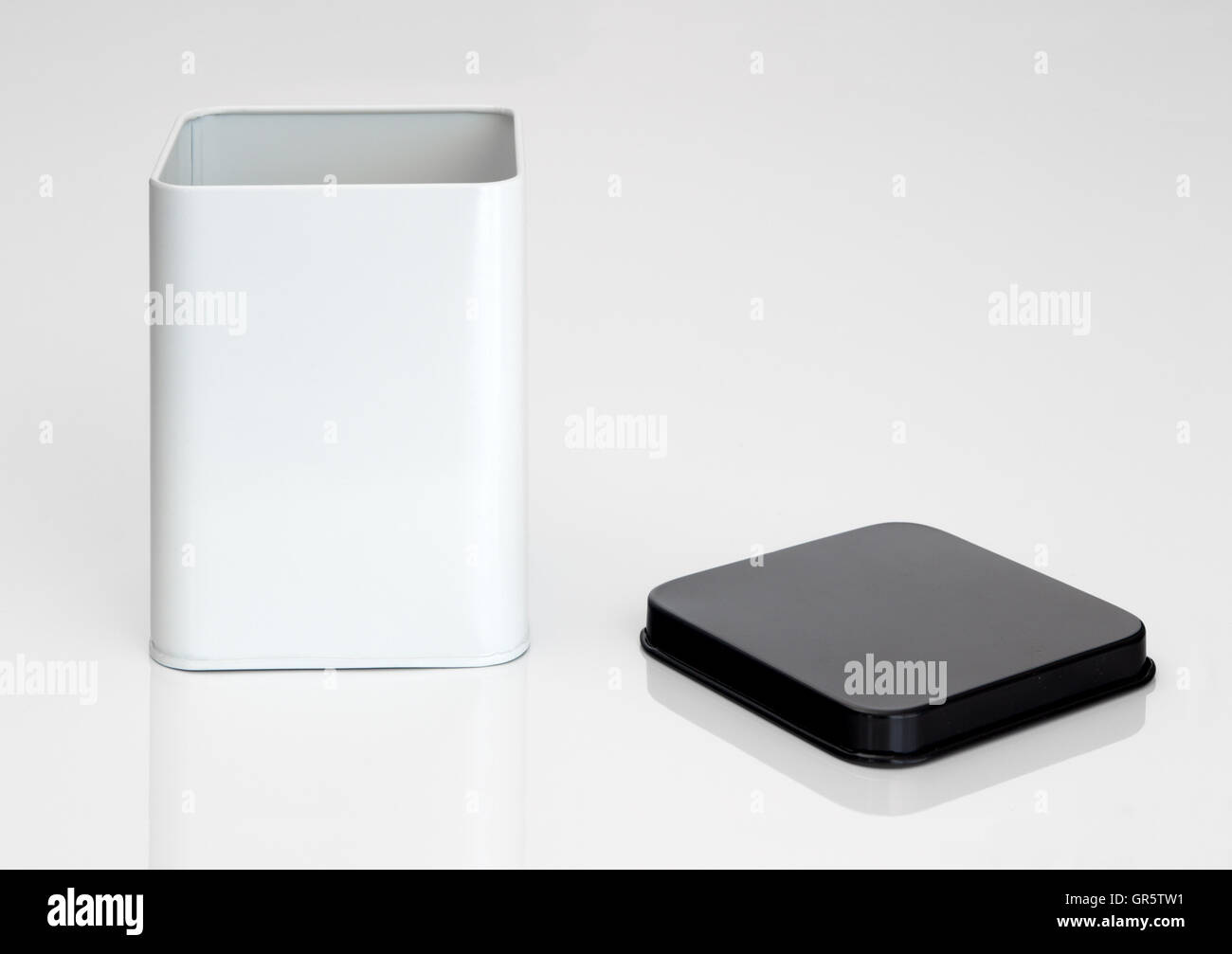 Open metal container on white background Stock Photo - Alamy