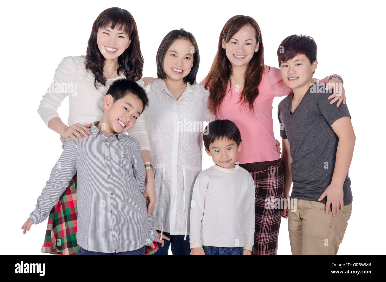 Family member smiling in group Stock Photo - Alamy