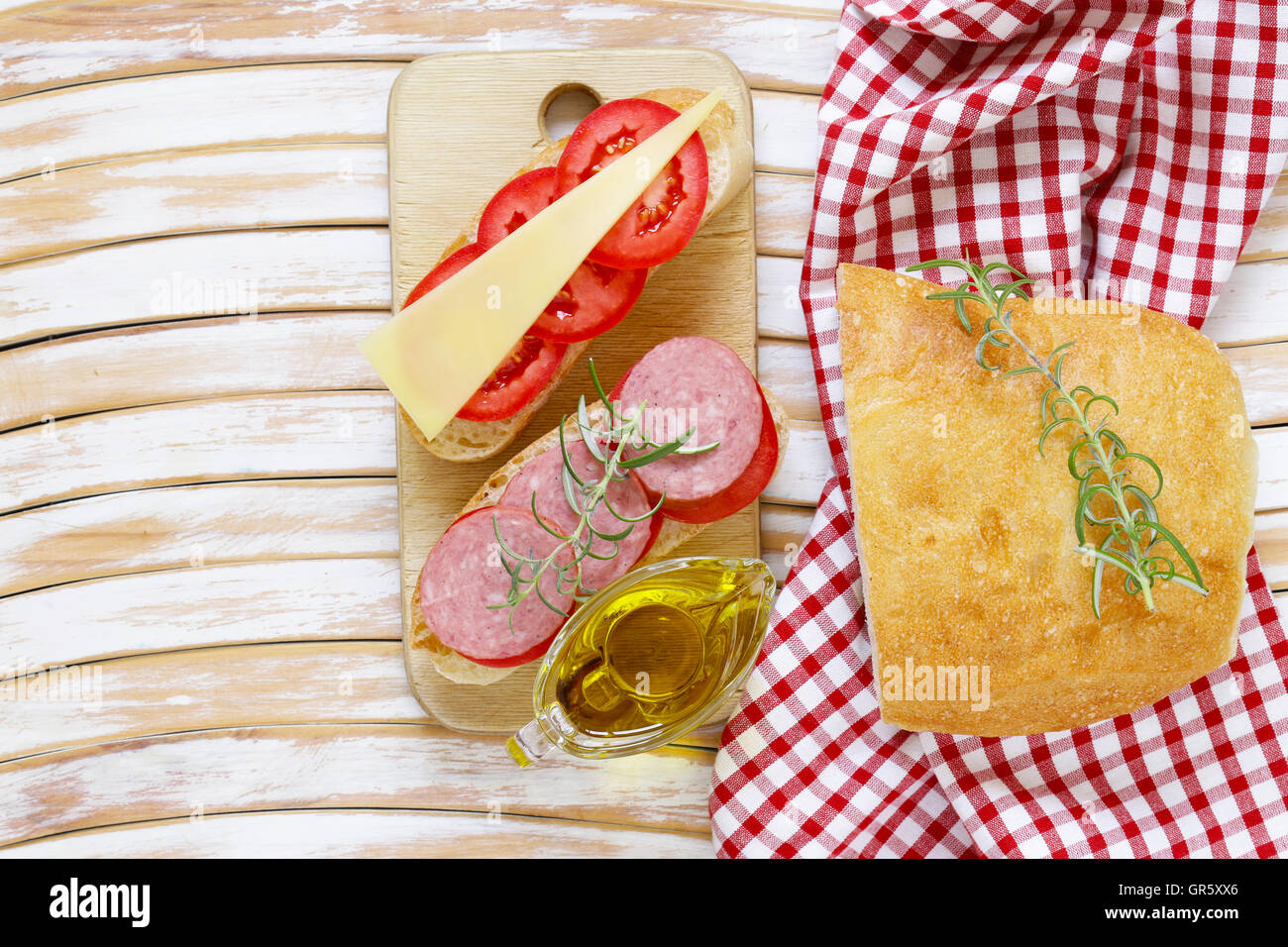 traditional Italian ciabatta bread with cheese, sausage, tomatoes and ...