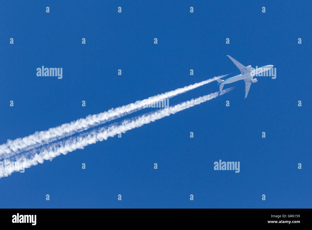 KLM (Royal Dutch Airlines) Boeing 777 airliner flying at high altitude ...