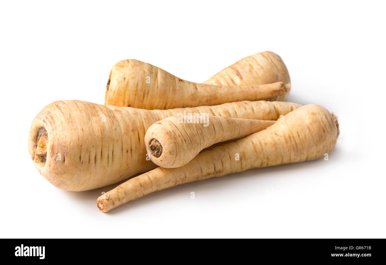 Fresh parsnip roots on a white background Stock Photo - Alamy