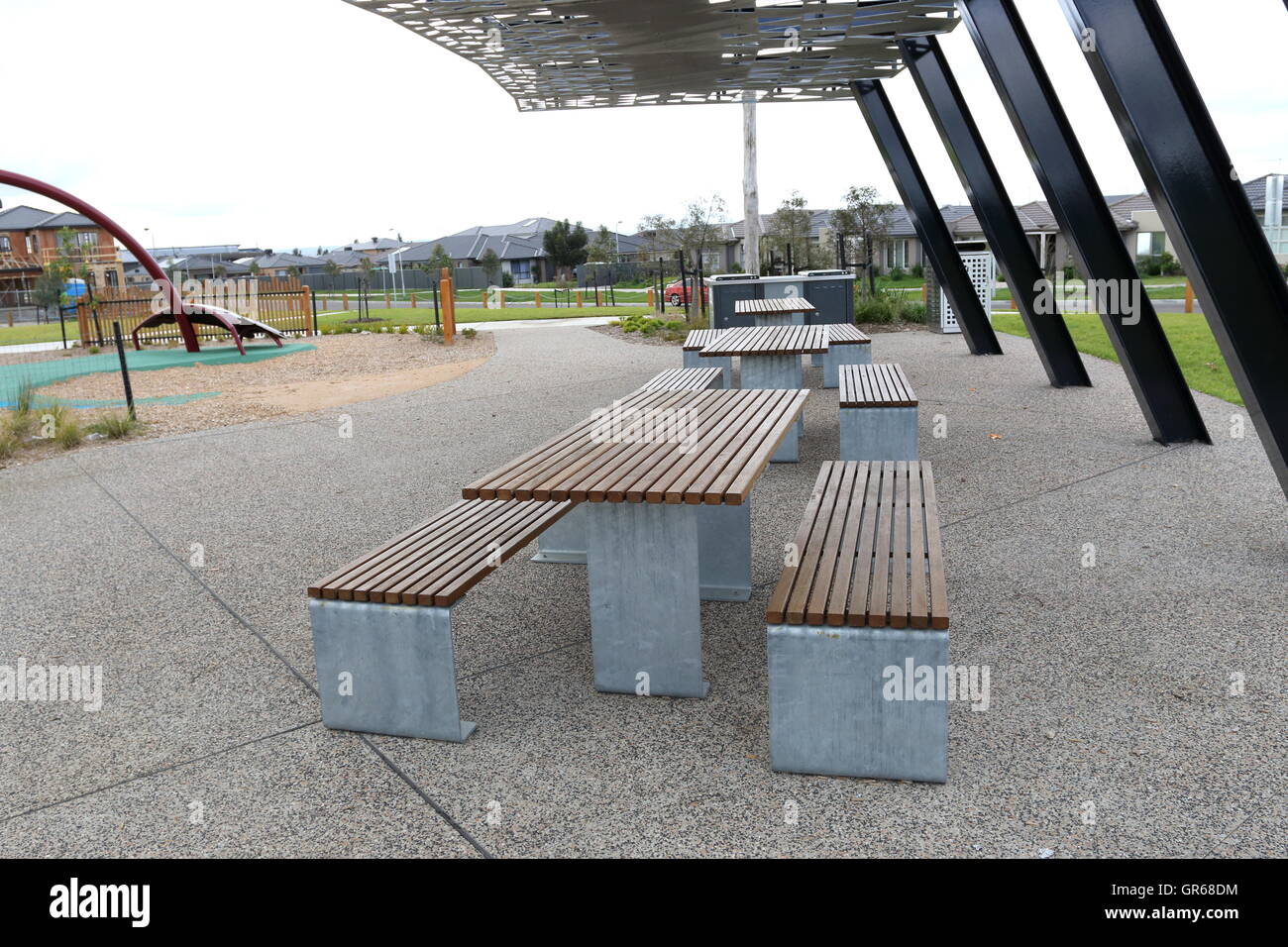 Wooden Picnic table in the park Stock Photo - Alamy