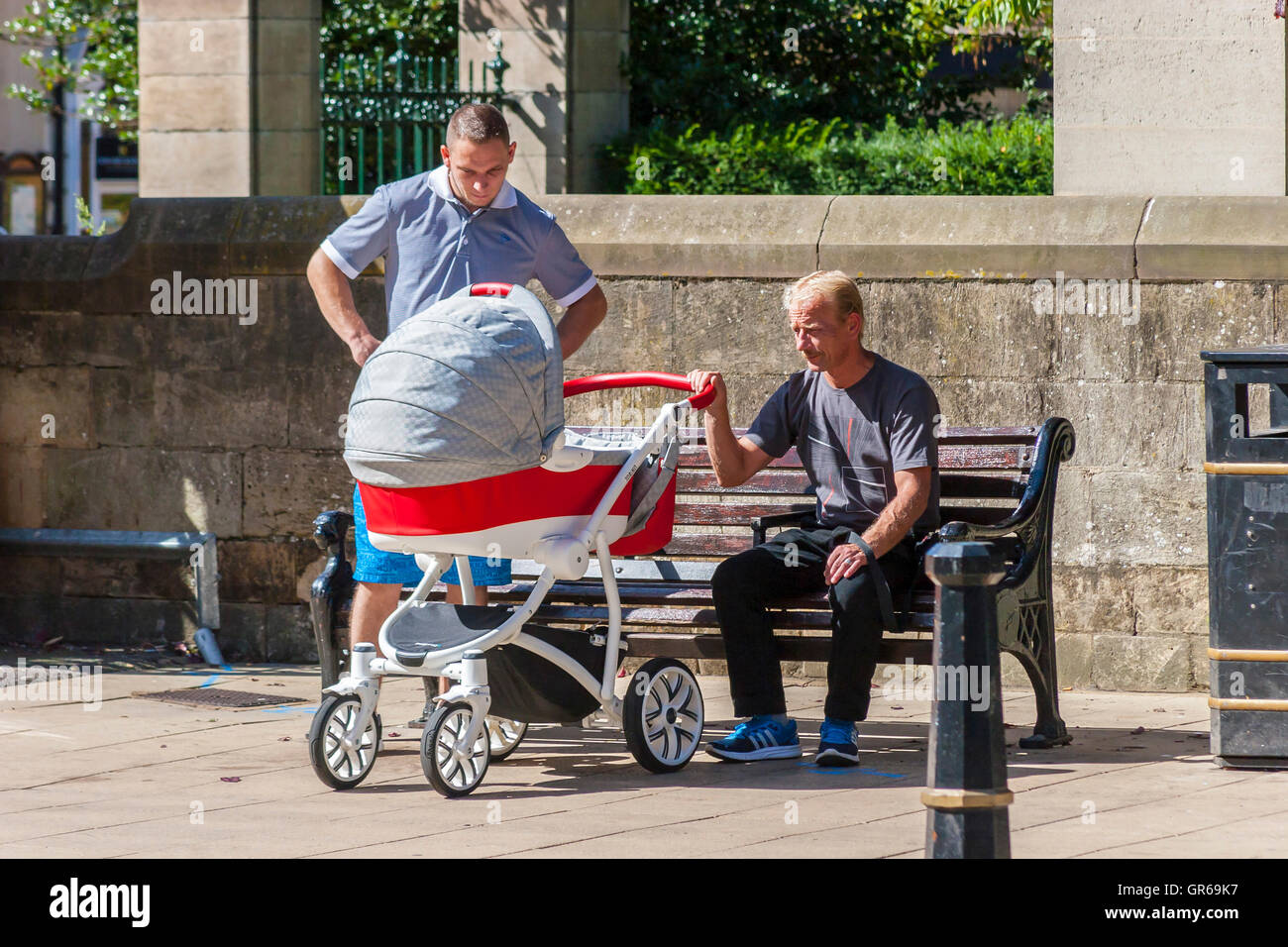 Dad left with the baby, Northampton town centre Stock Photo - Alamy