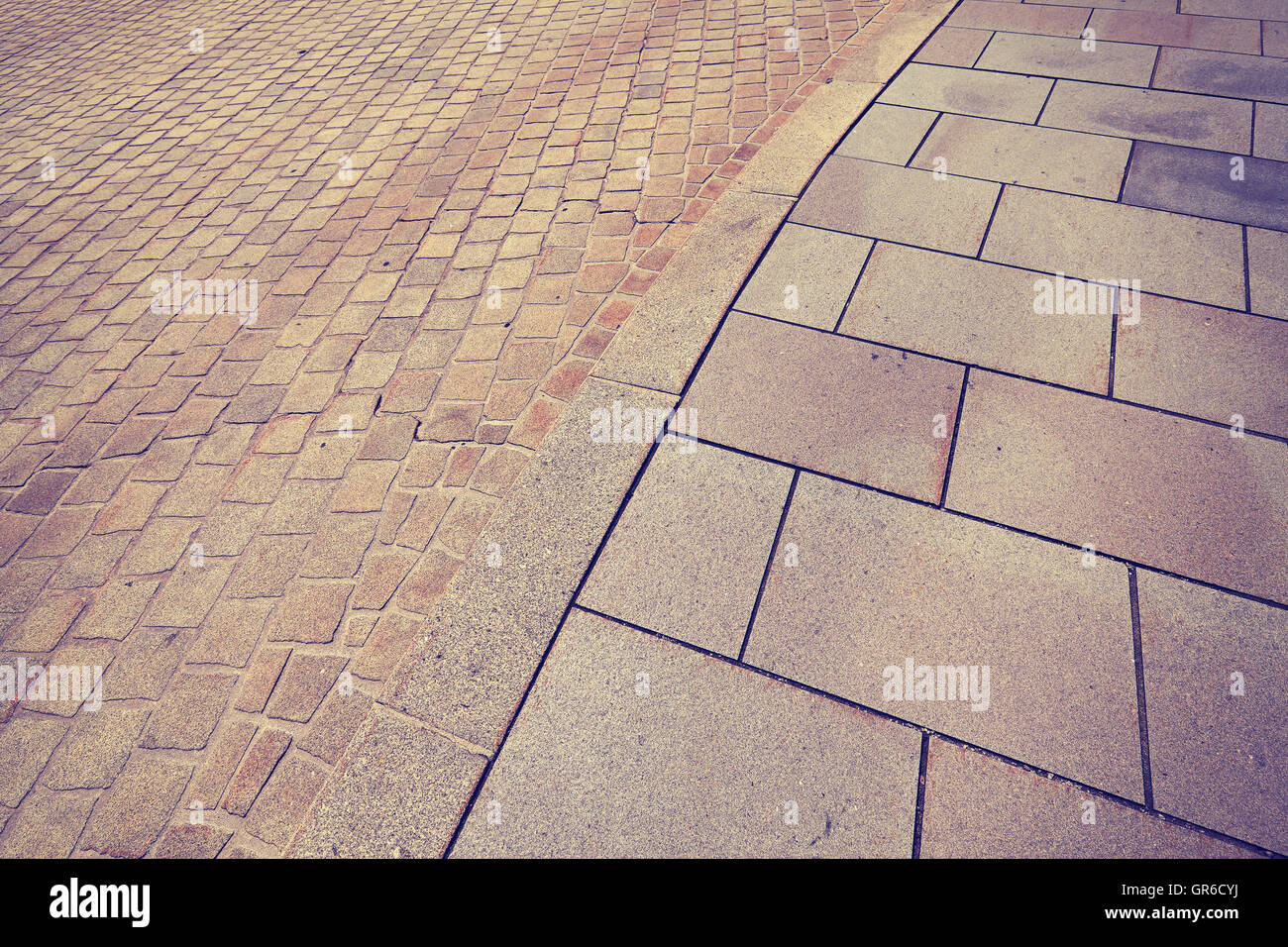 Vintage toned photo of a street curb and pavement Stock Photo - Alamy