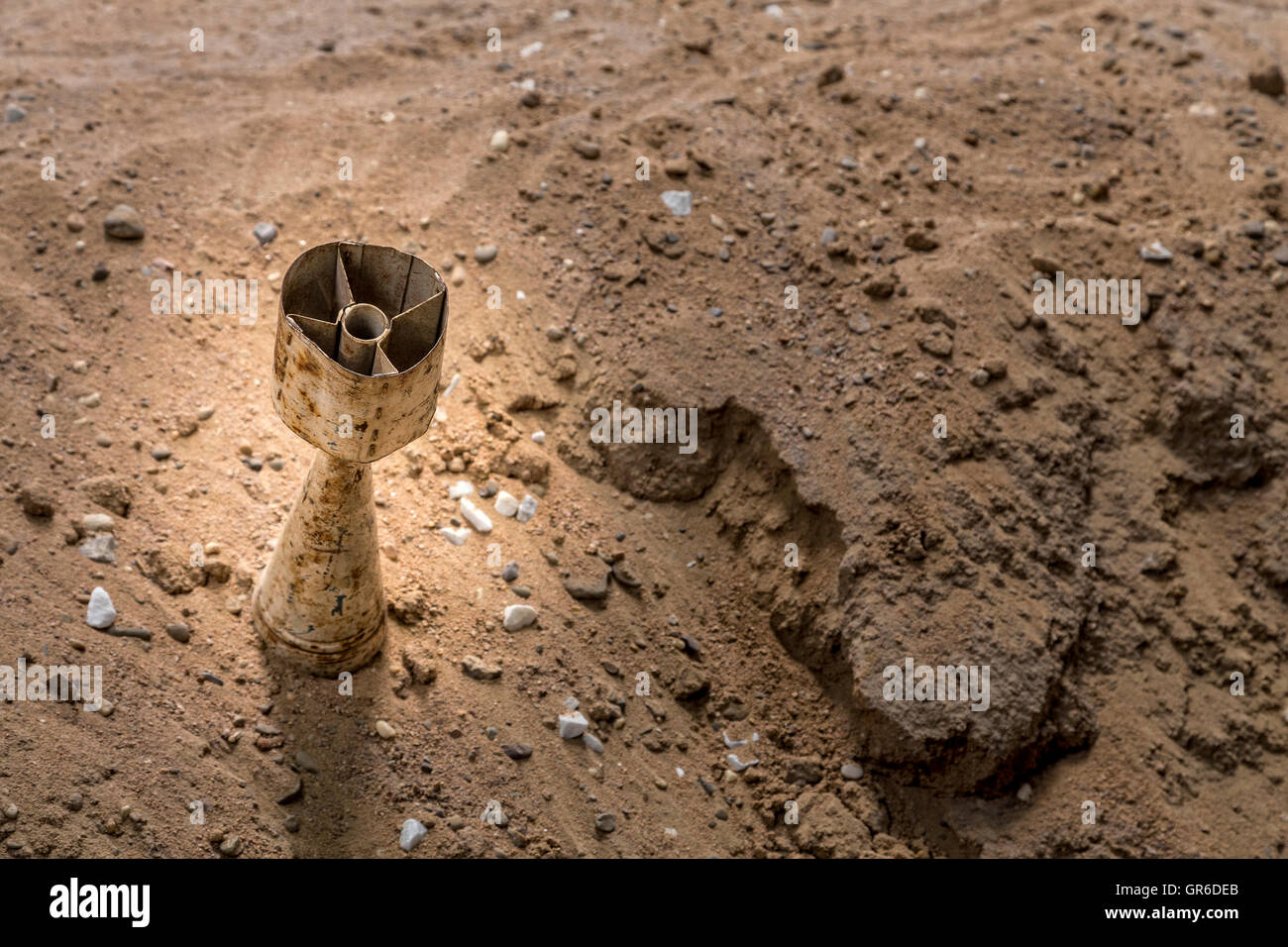 Grenade In The Sand Stock Photo - Alamy