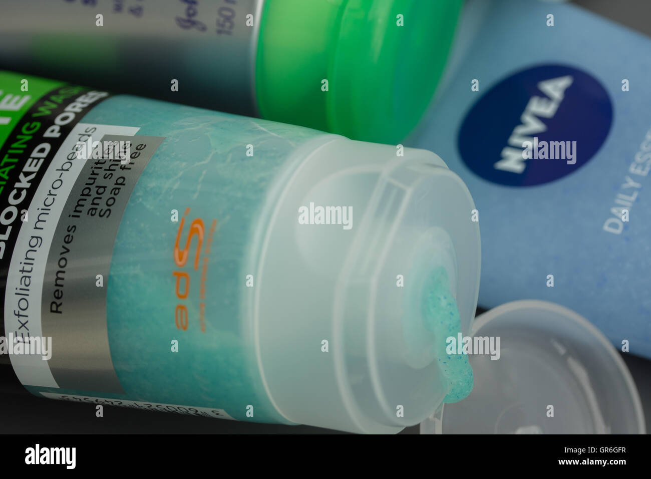 A variety of exfoliating body wash products containing plastic ...