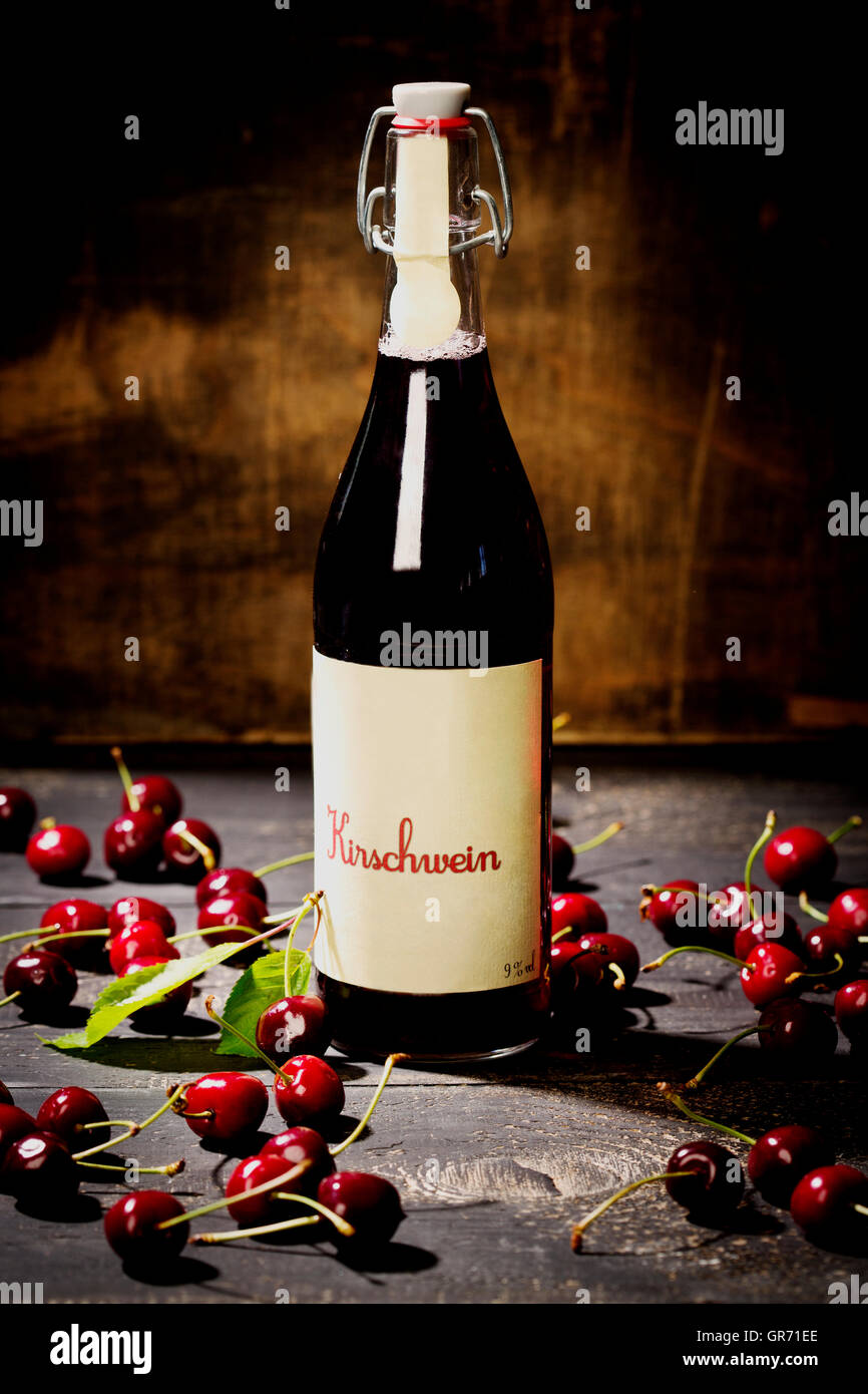 Cherries And Cherry Wine Stock Photo - Alamy