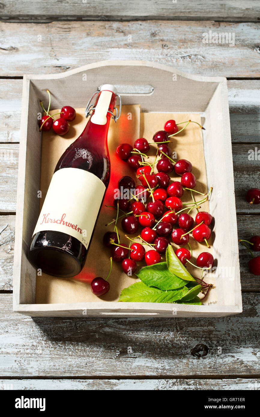 Cherries And Cherry Wine Stock Photo - Alamy