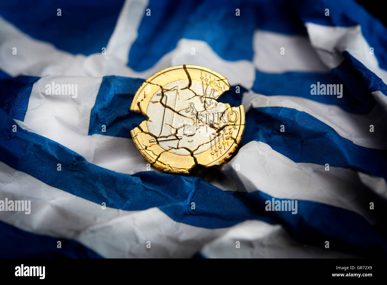 Broken Euro Coin In Front Of Flag Of Greece High Resolution Stock ...