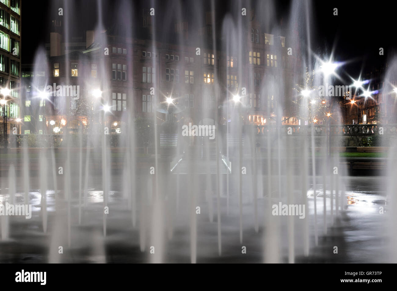 Fountain in the night Stock Photo - Alamy