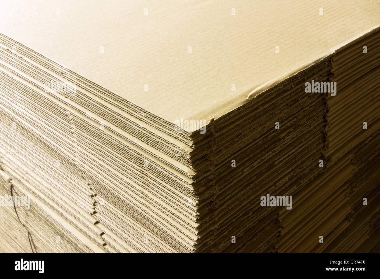 Stacked cardboards - closeup Stock Photo - Alamy