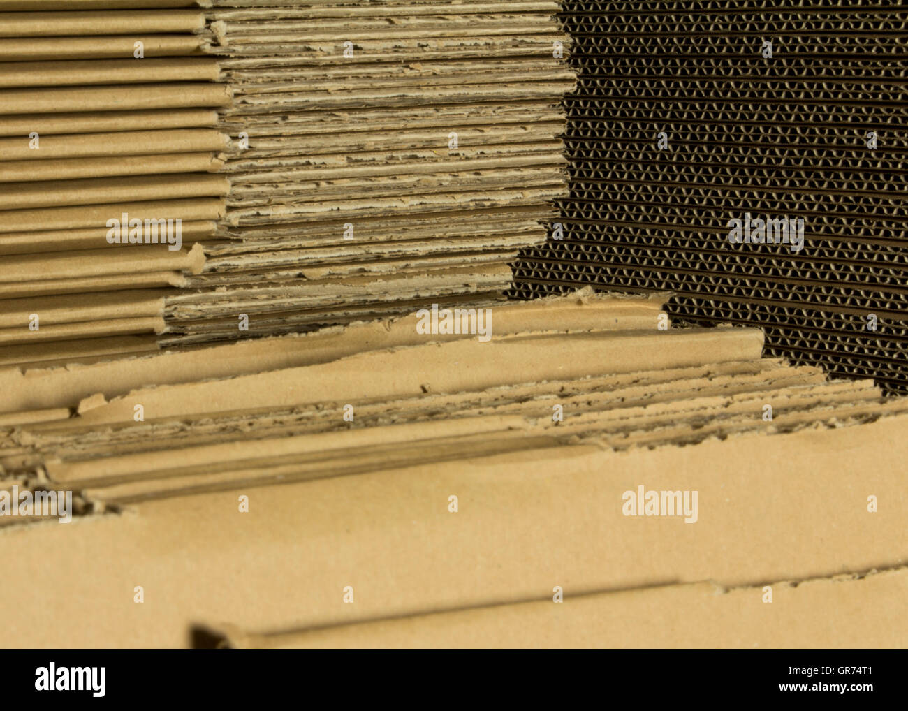 Stacked cardboards closeup Stock Photo - Alamy