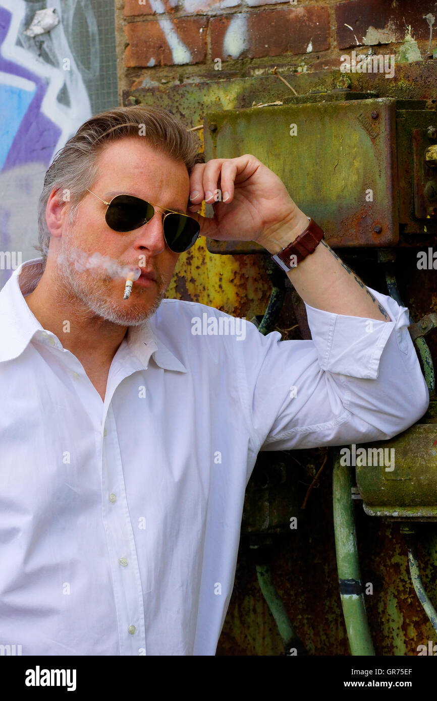 Man With Cigarette Stock Photo - Alamy