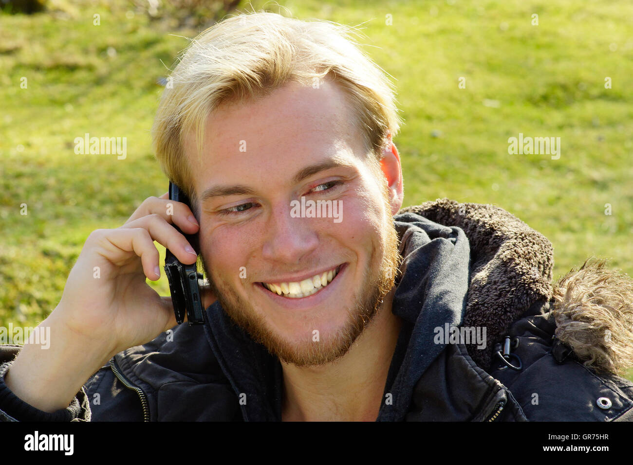 Young Man With Smartphone Stock Photo - Alamy