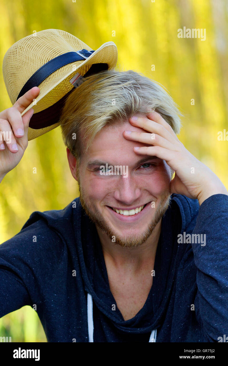 Young man hat hi-res stock photography and images - Alamy