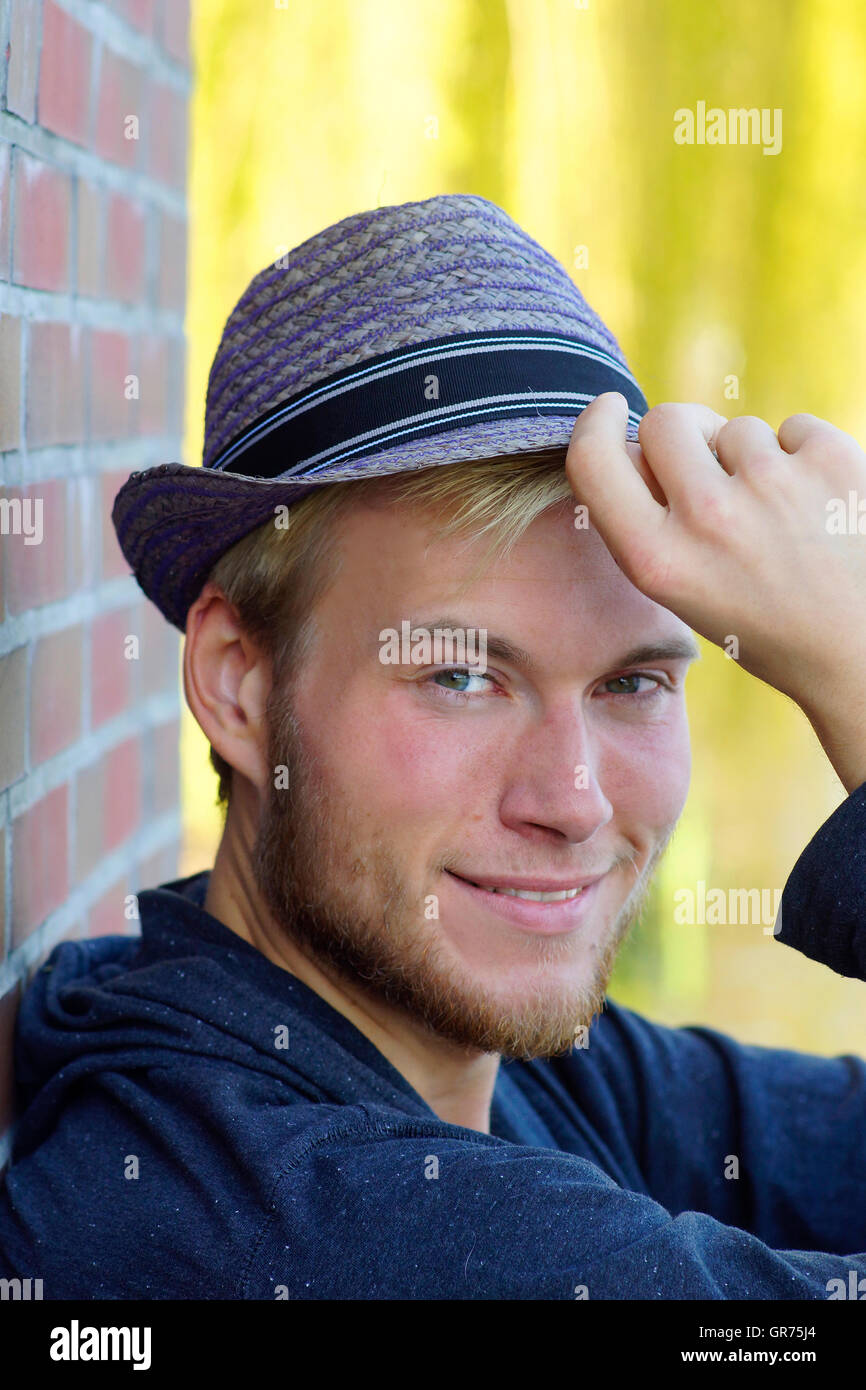 Young Man With Hat Stock Photo - Alamy