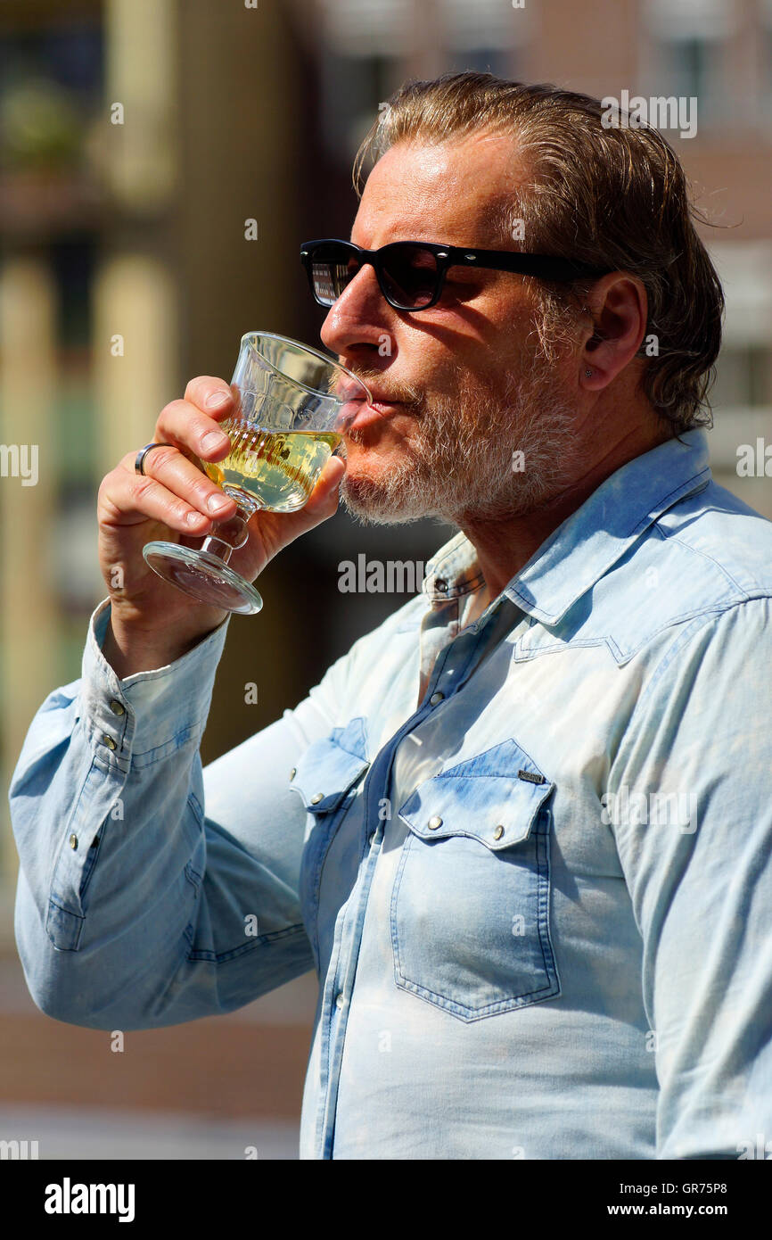 Cool drink man hi-res stock photography and images - Alamy