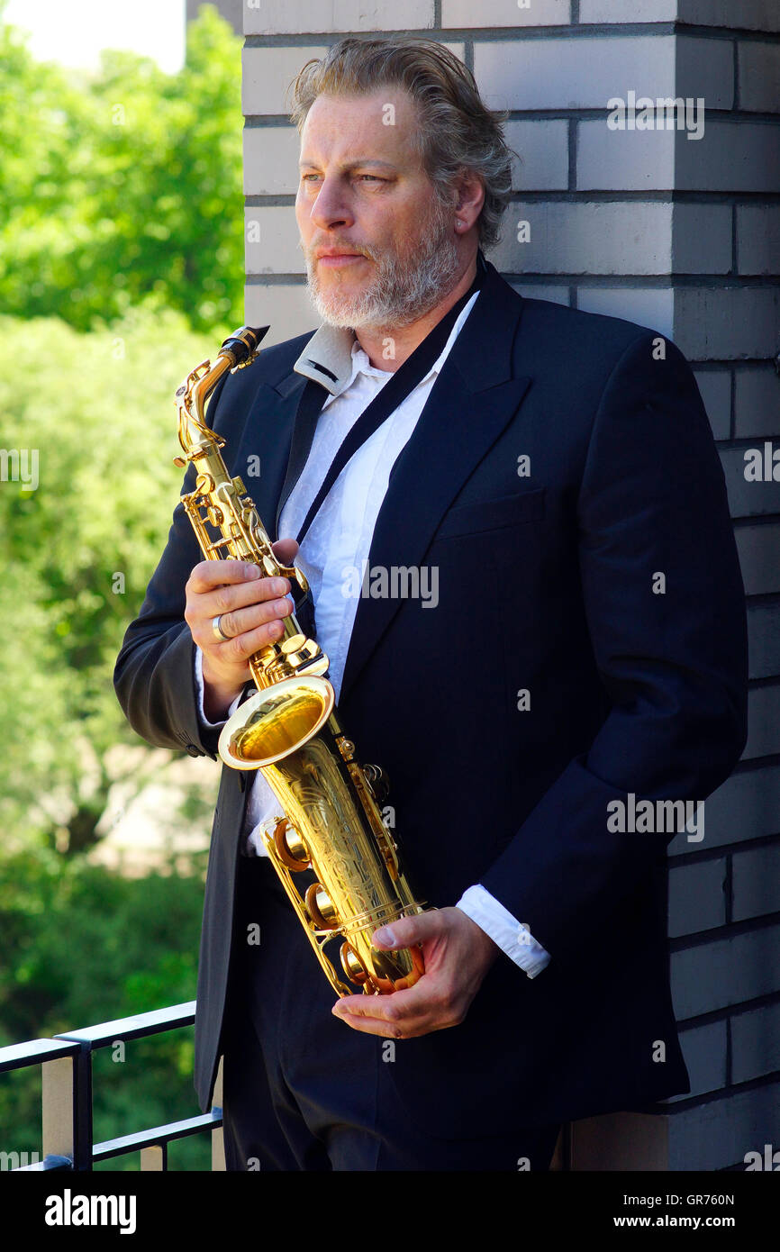 Man With Saxophone Stock Photo - Alamy
