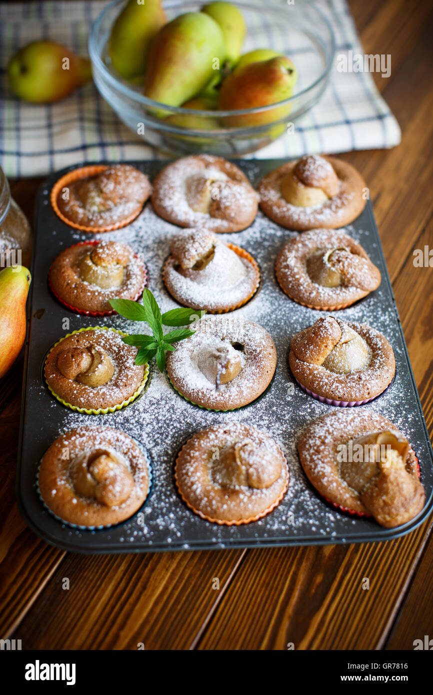 sweet muffins with pears Stock Photo - Alamy