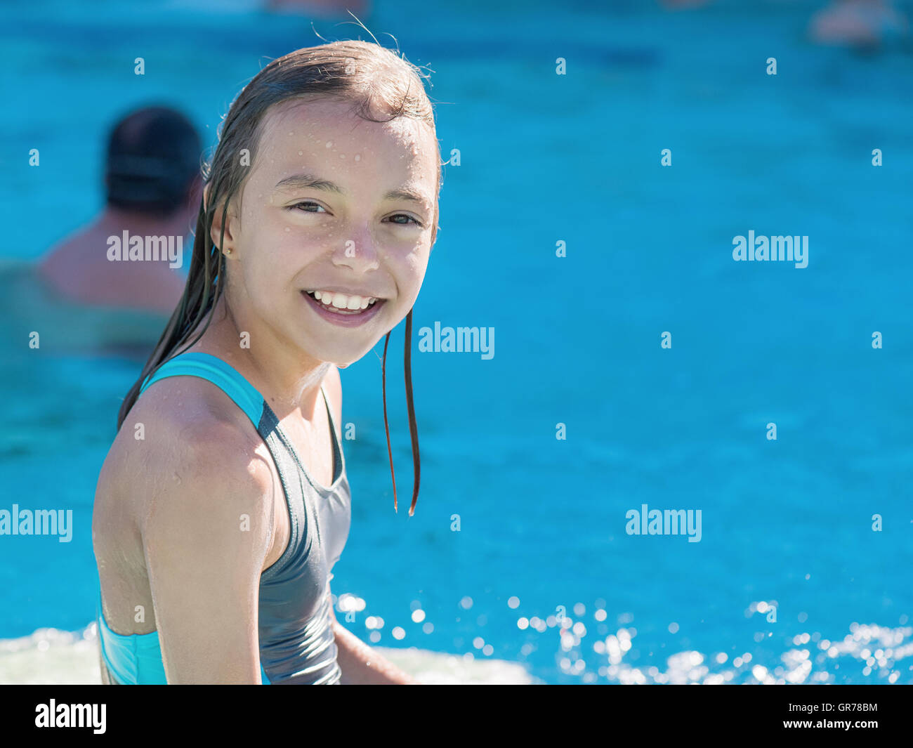 Happy girl in pool Stock Photo - Alamy
