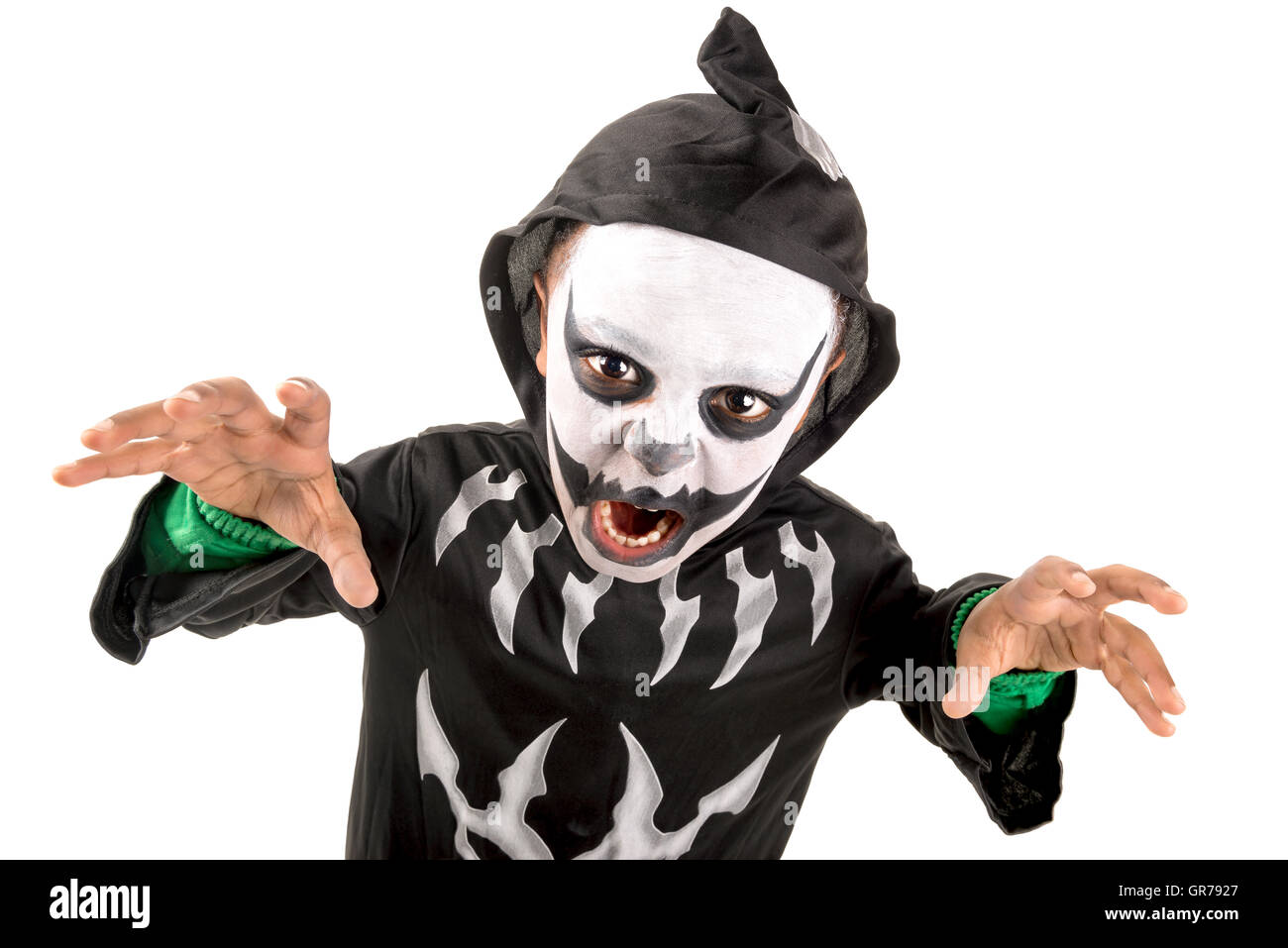 Boy with face-paint and skeleton Halloween costume isolated in white ...