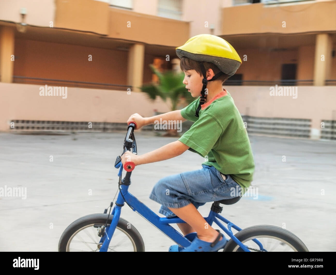 Boy with a bicycle wheel hi-res stock photography and images - Alamy