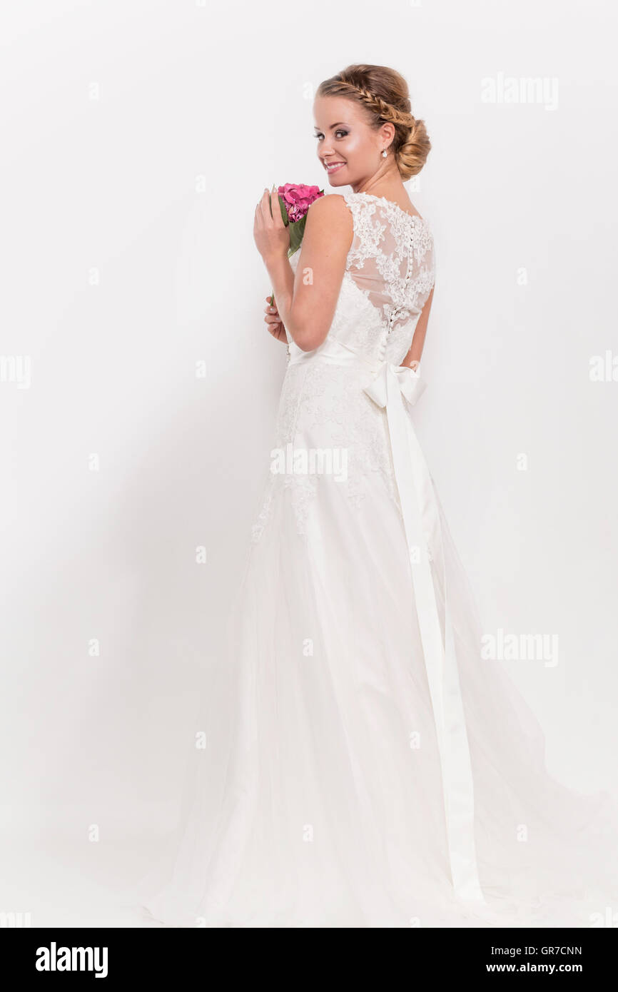 Young Bride In White Wedding Dress On A White Background Stock Photo ...