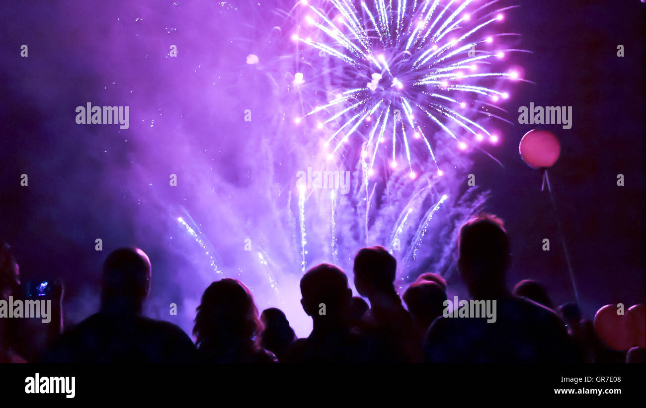 Crowd watch ing fireworks and celebrating Stock Photo - Alamy