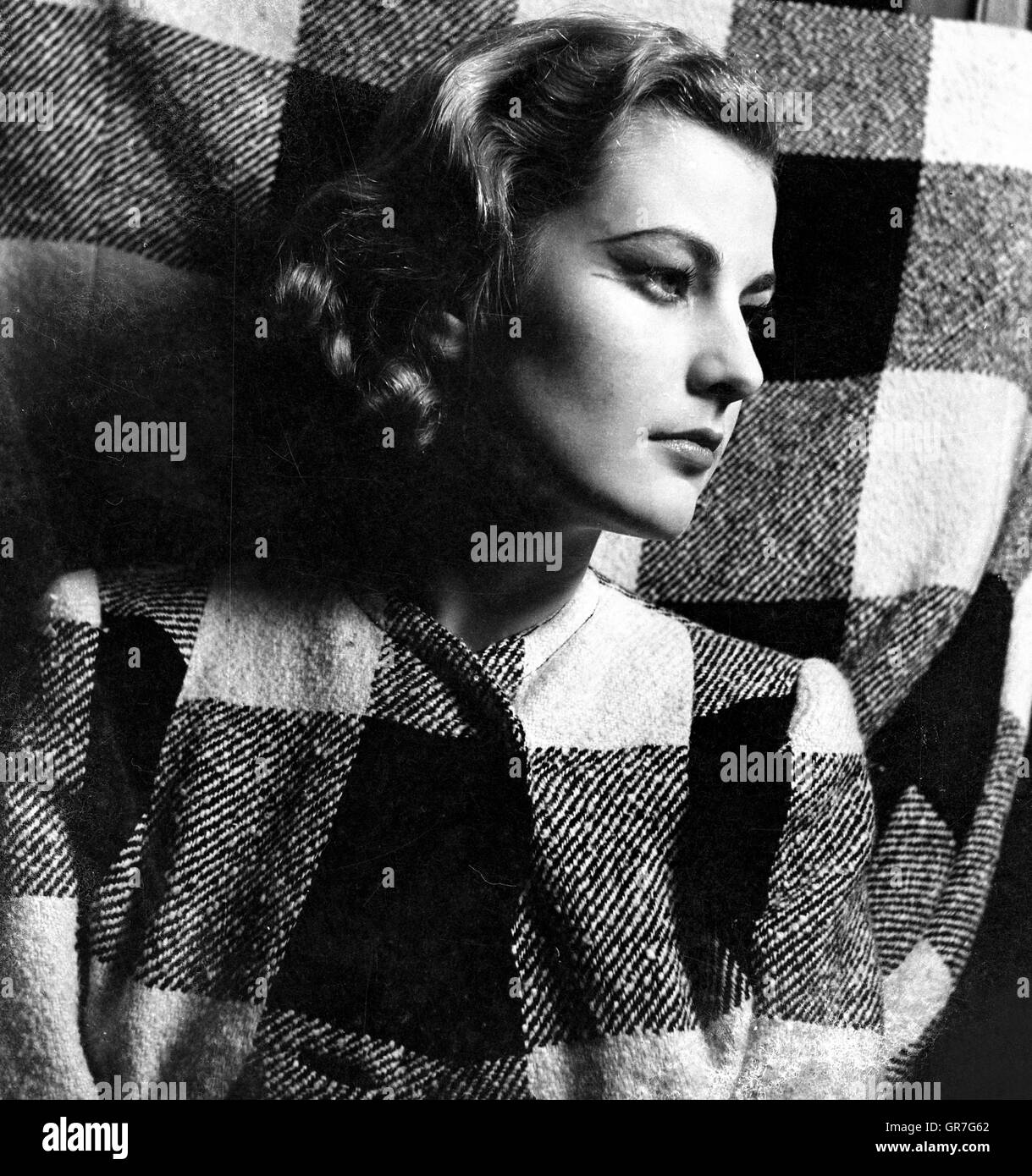 1940's Portrait of a woman in chequered (checked) clothing with ...