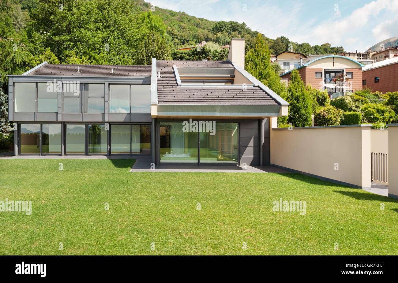 beautiful modern villa with garden, external Stock Photo - Alamy