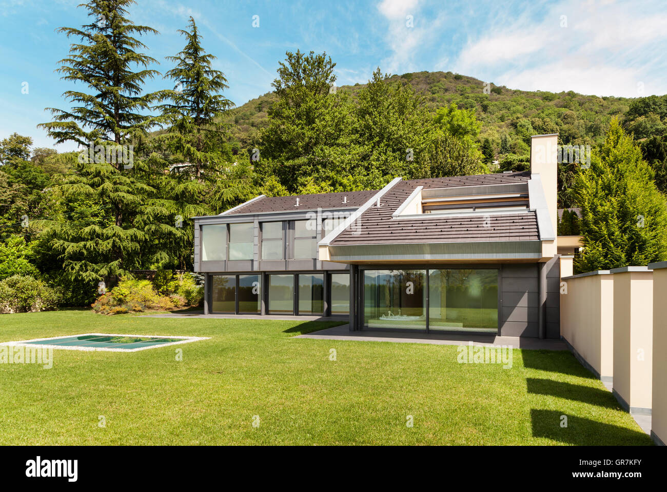 beautiful modern villa with garden, external Stock Photo - Alamy