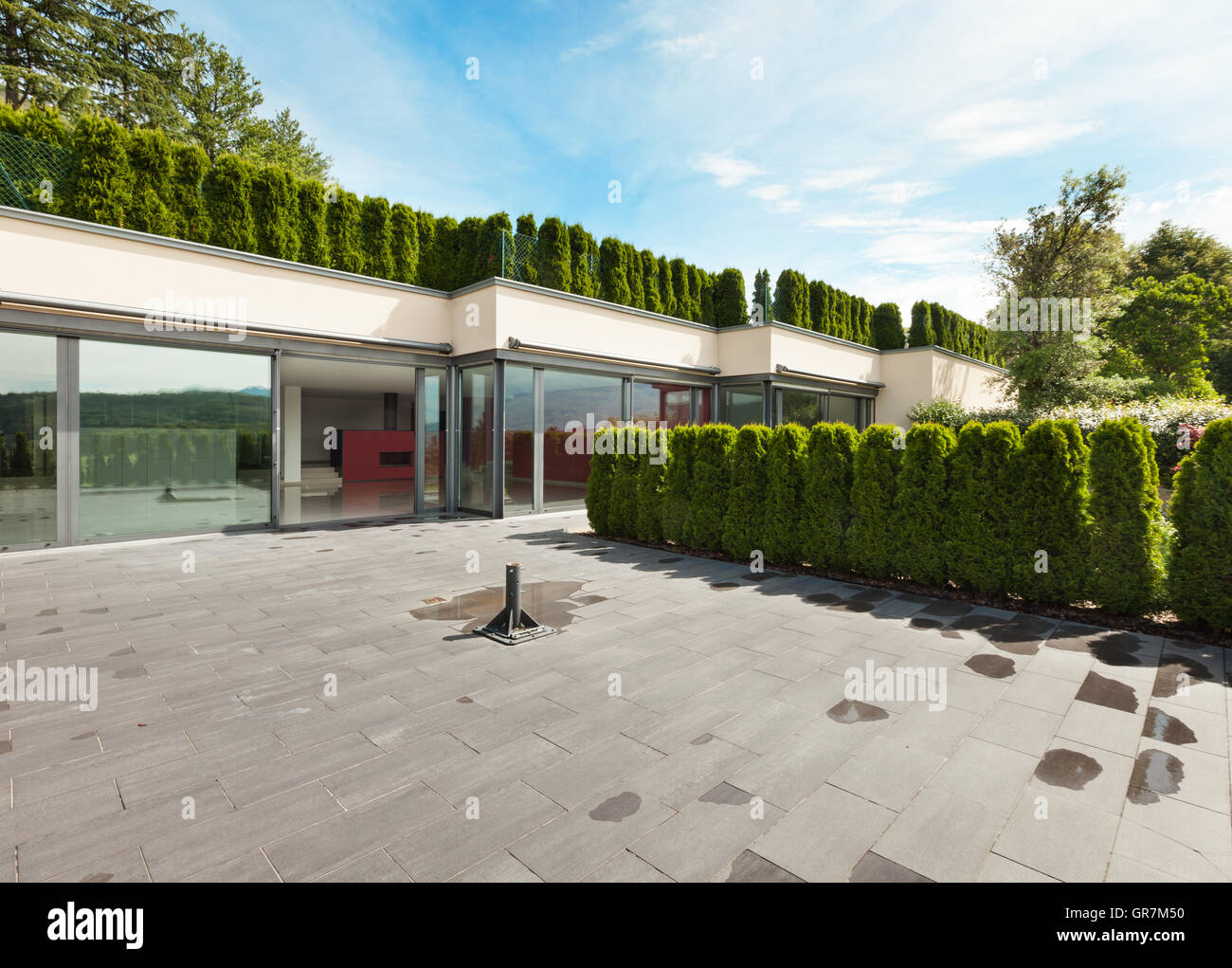 modern house with garden, external, view from patio Stock Photo - Alamy