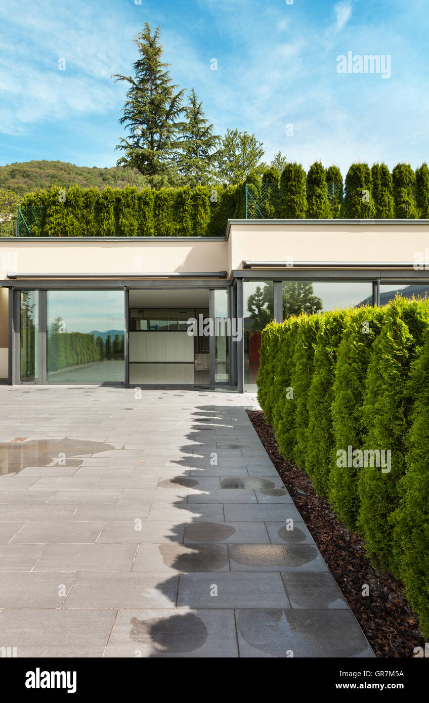 modern house with garden, external, view from patio Stock Photo - Alamy