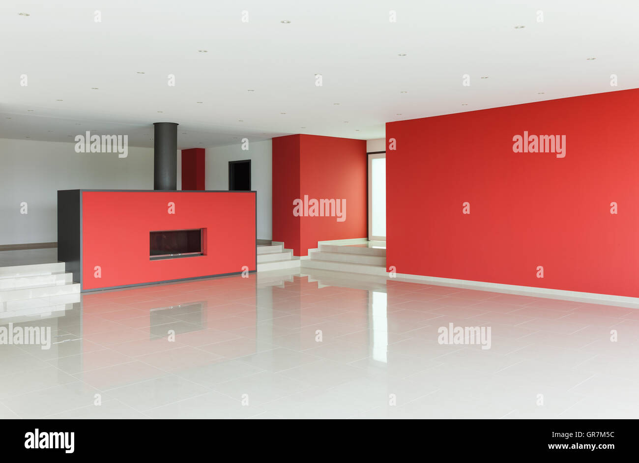Interior modern villa, wide living room, red walls Stock Photo - Alamy