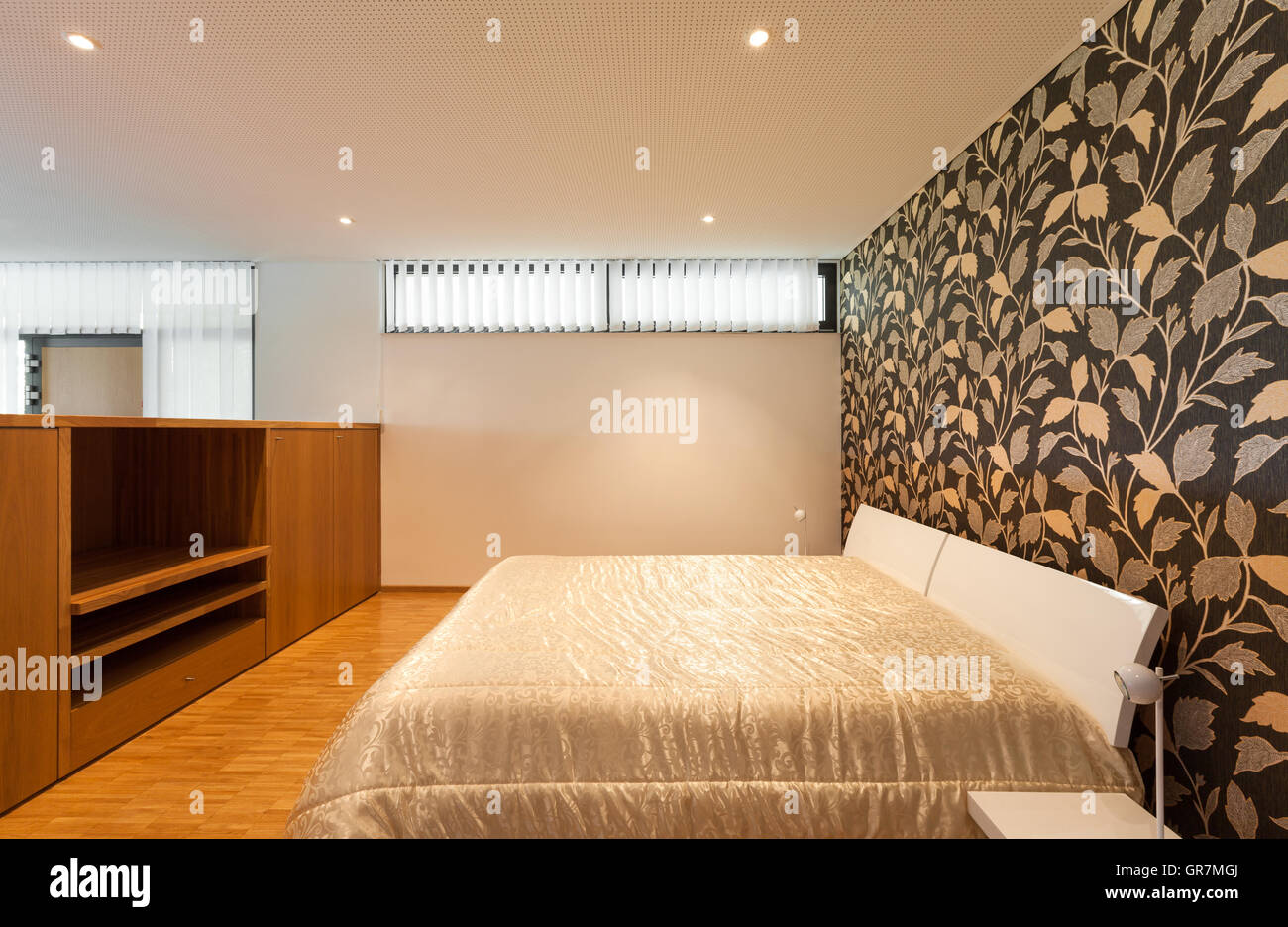 Interior modern house, wide bedroom, double bed Stock Photo - Alamy