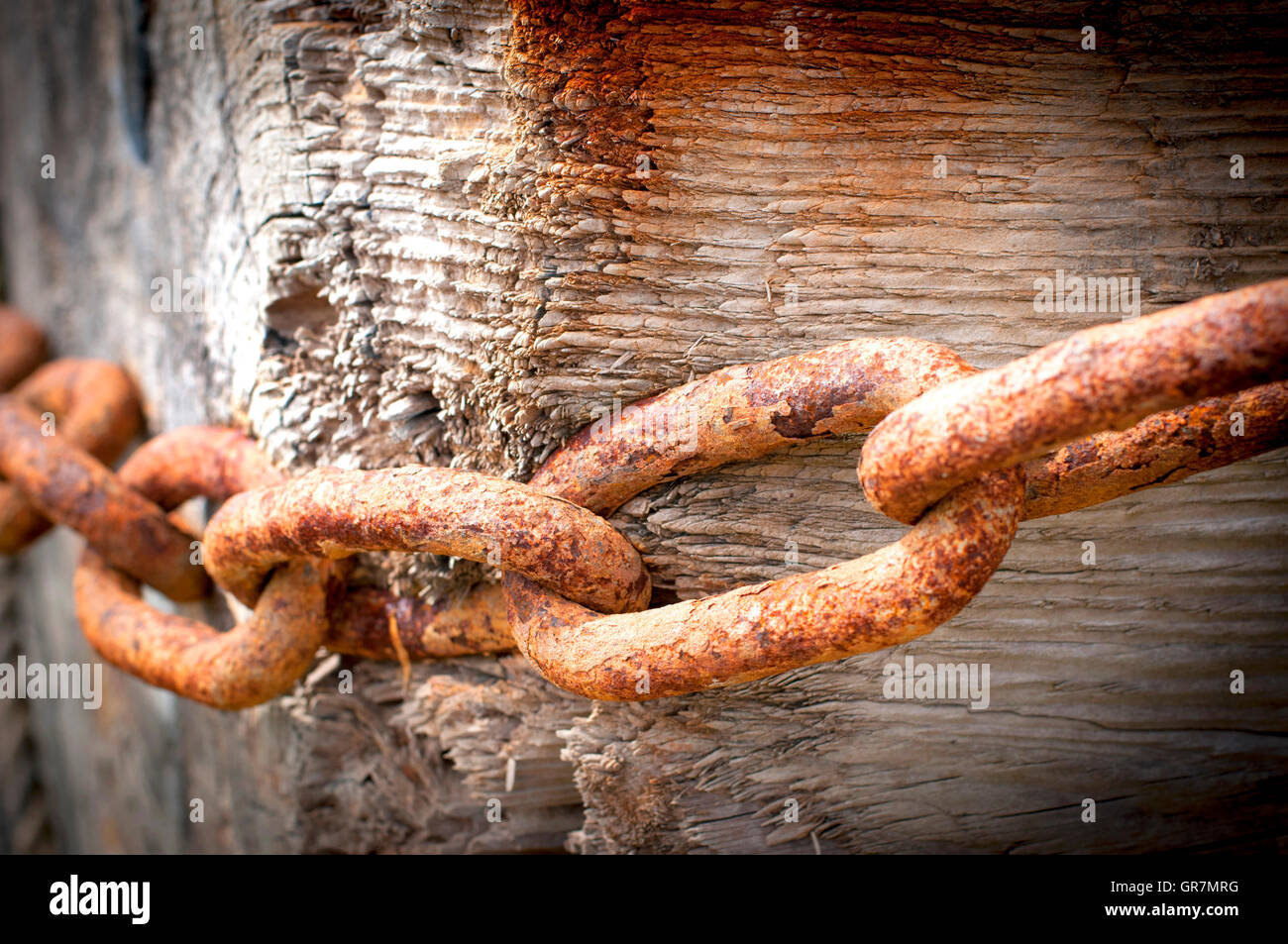 Old mooring blocks with rusting chains, Faversham Creek, Kent Stock ... Old mooring blocks with rusting chains, Faversham Creek, Kent Stock ...