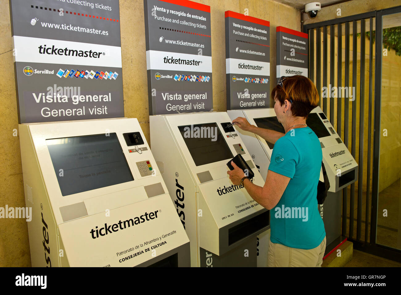 Visitor Buying Tickets At The Modern Self-Service Ticket Terminals At ...