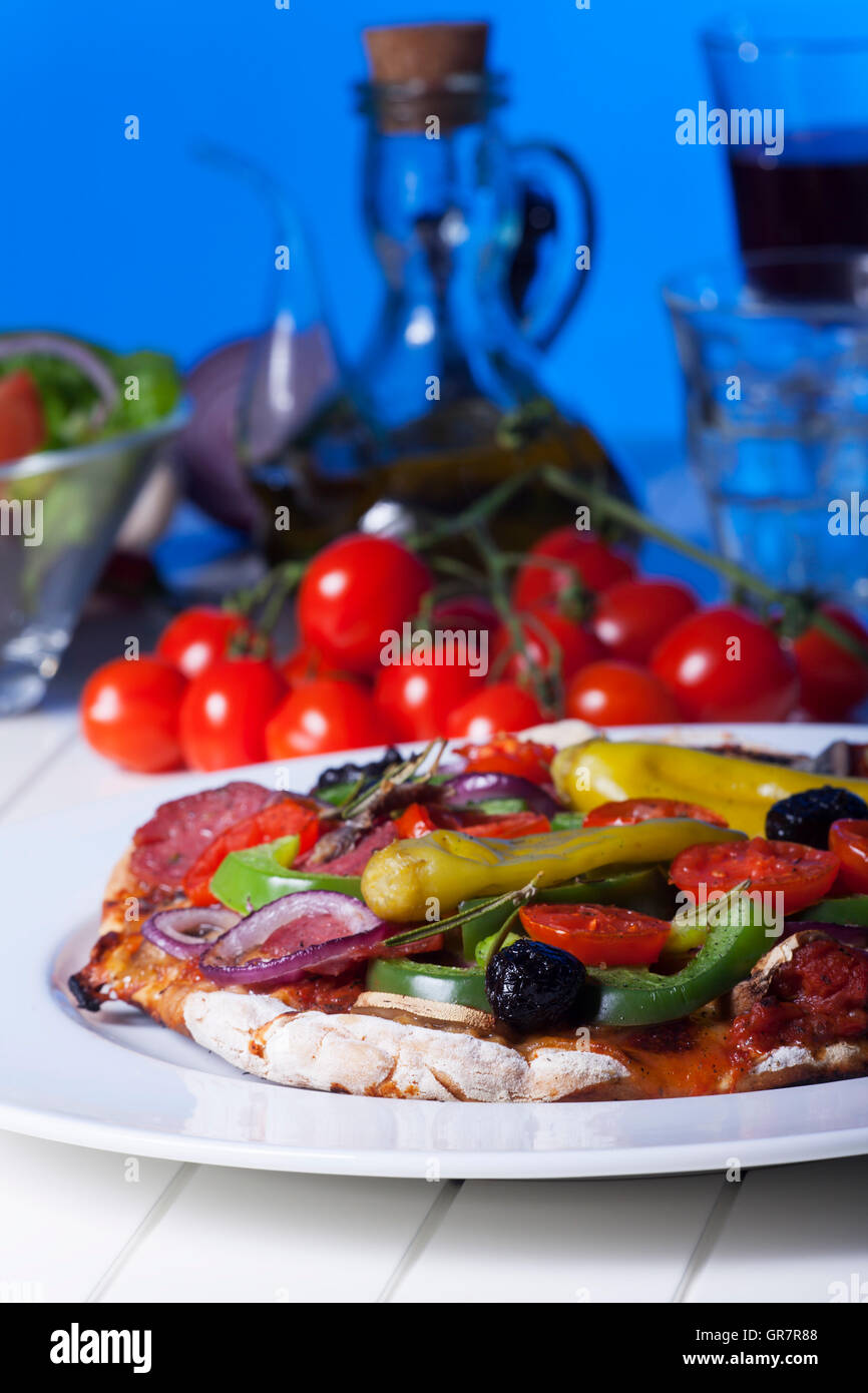 Italian Pizza On Blue Stock Photo - Alamy